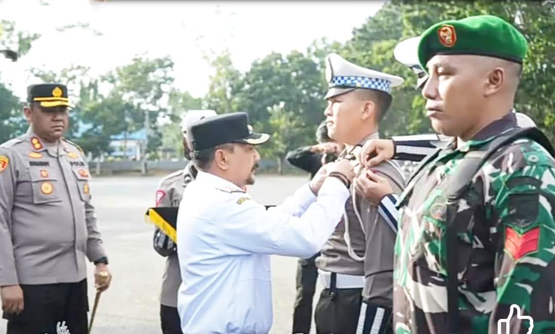 Pj Bupati Syamsir Pimpinan Apel Gelar Pasukan Operasi Kepolisian Ketupat 2024 di Tala ...